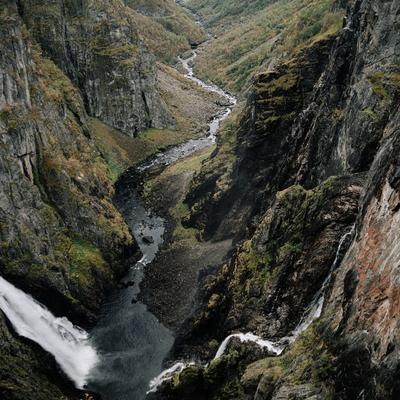 fast-waterfalls-flowing-into-river-between-mountains - KDE Store