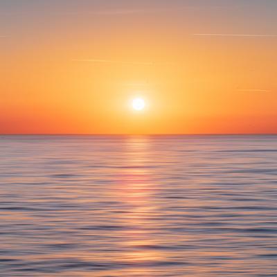 calm-water-with-sun-and-orange-sky - KDE Store