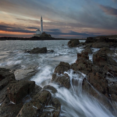 Lighthouse on rocks - KDE Store