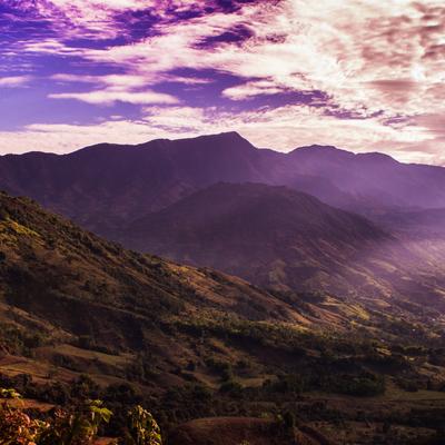 Green and Brown Mountains Under Cloudy Sky During Daytime Fu - KDE Store