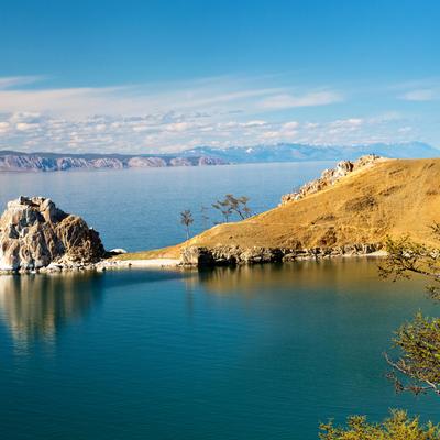 Blue Lake Surrounded by Brown and Green Mountains Under Blu - KDE Store