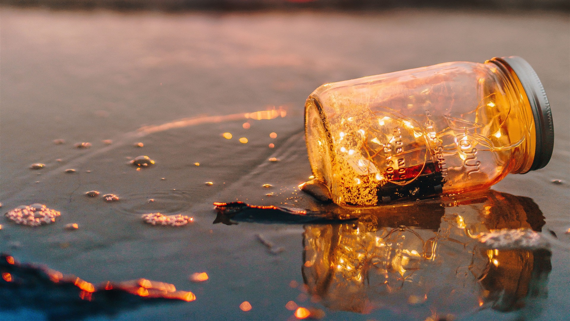 Beach glass bottle lights sunset reflection - KDE Store